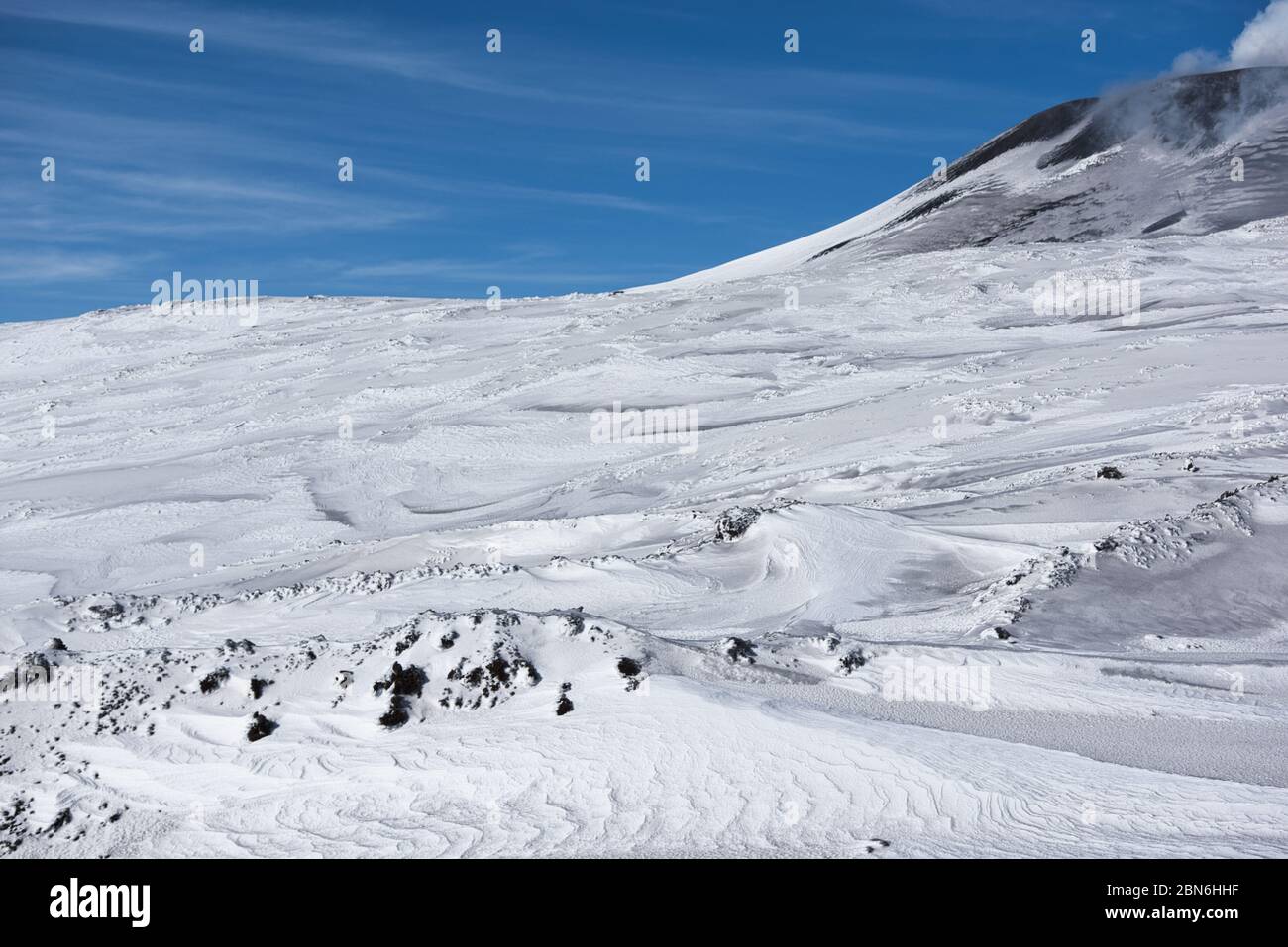 Snowy side of a volcano mountain in Sicily Stock Photo - Alamy