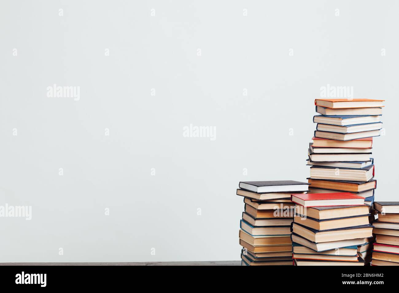 many stacks of educational books to prepare for exams in the university ...