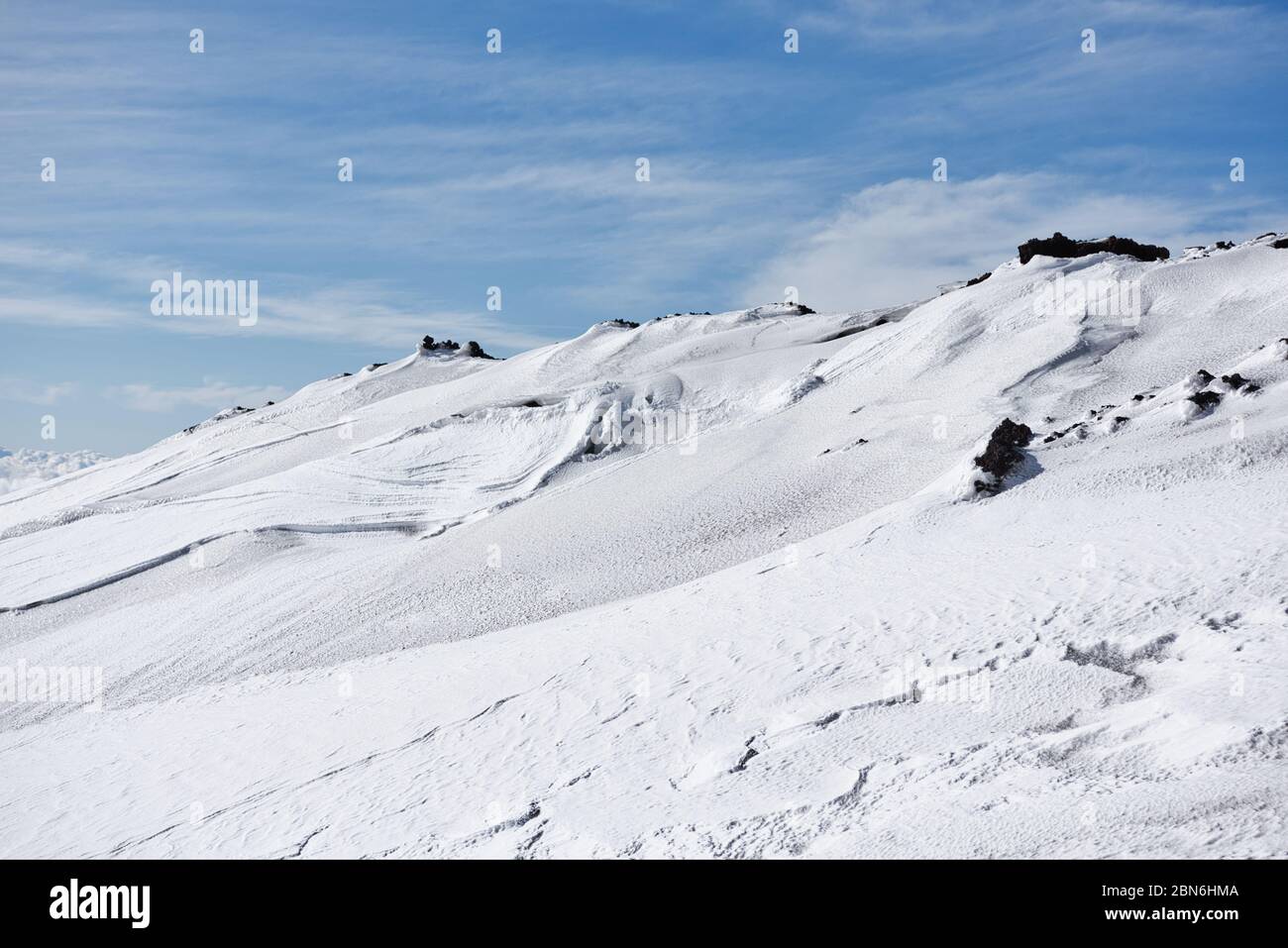 Snowy side of a volcano mountain in Sicily Stock Photo - Alamy