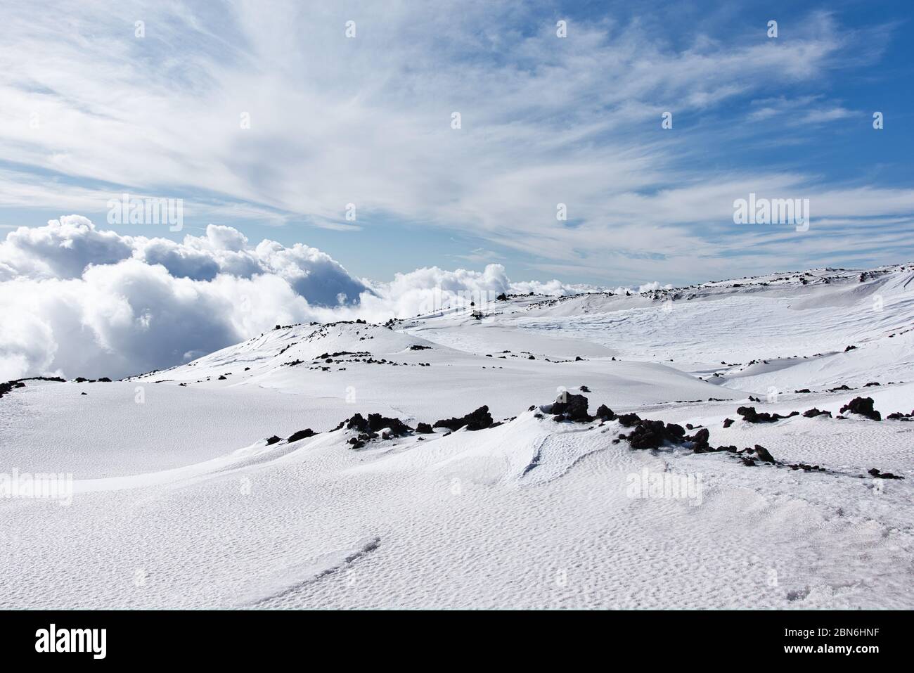 Snowy side of a volcano mountain in Sicily Stock Photo - Alamy