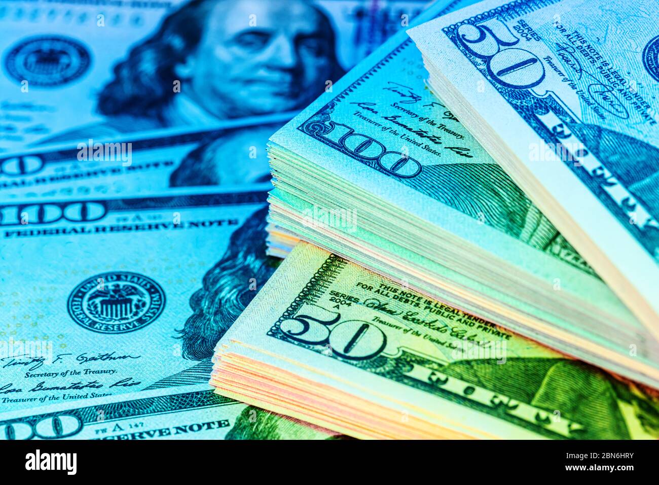 money background from dollars in neon light, close up Stock Photo - Alamy