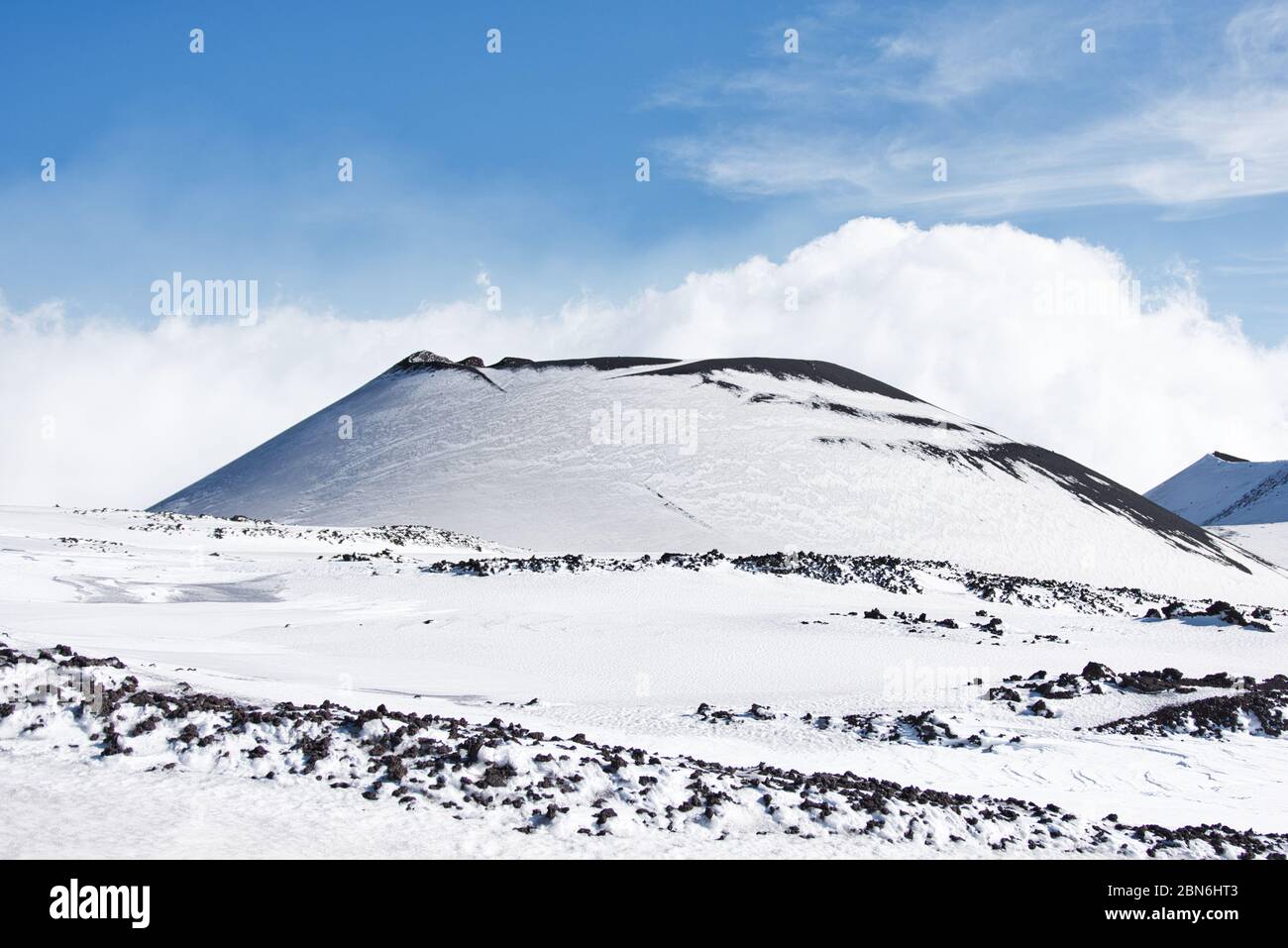 Snowy crater of a volcano mountain in Sicily Stock Photo - Alamy