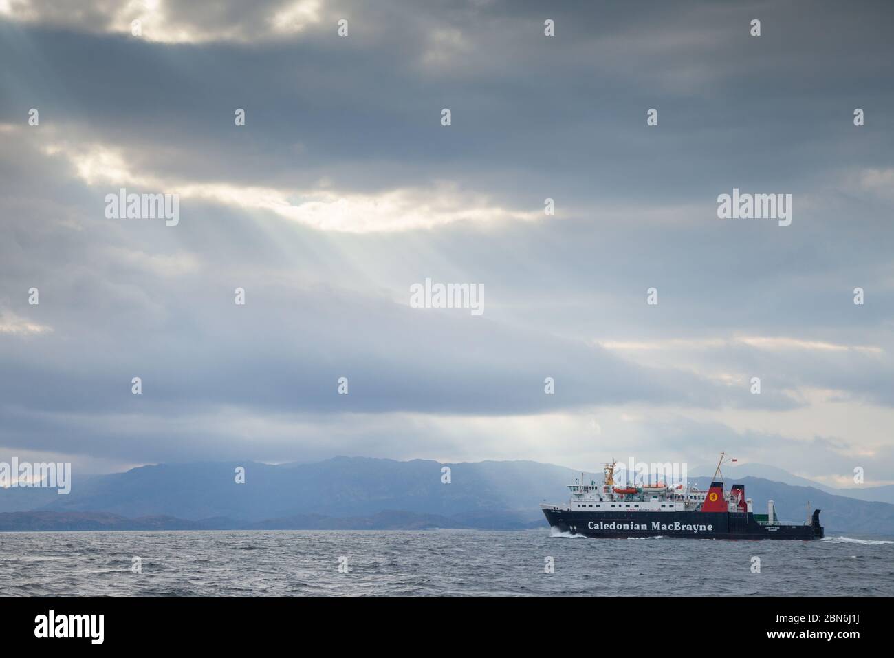 A small Caledonian MacBrayne ferry arriving leaving Loch Scresort on ...