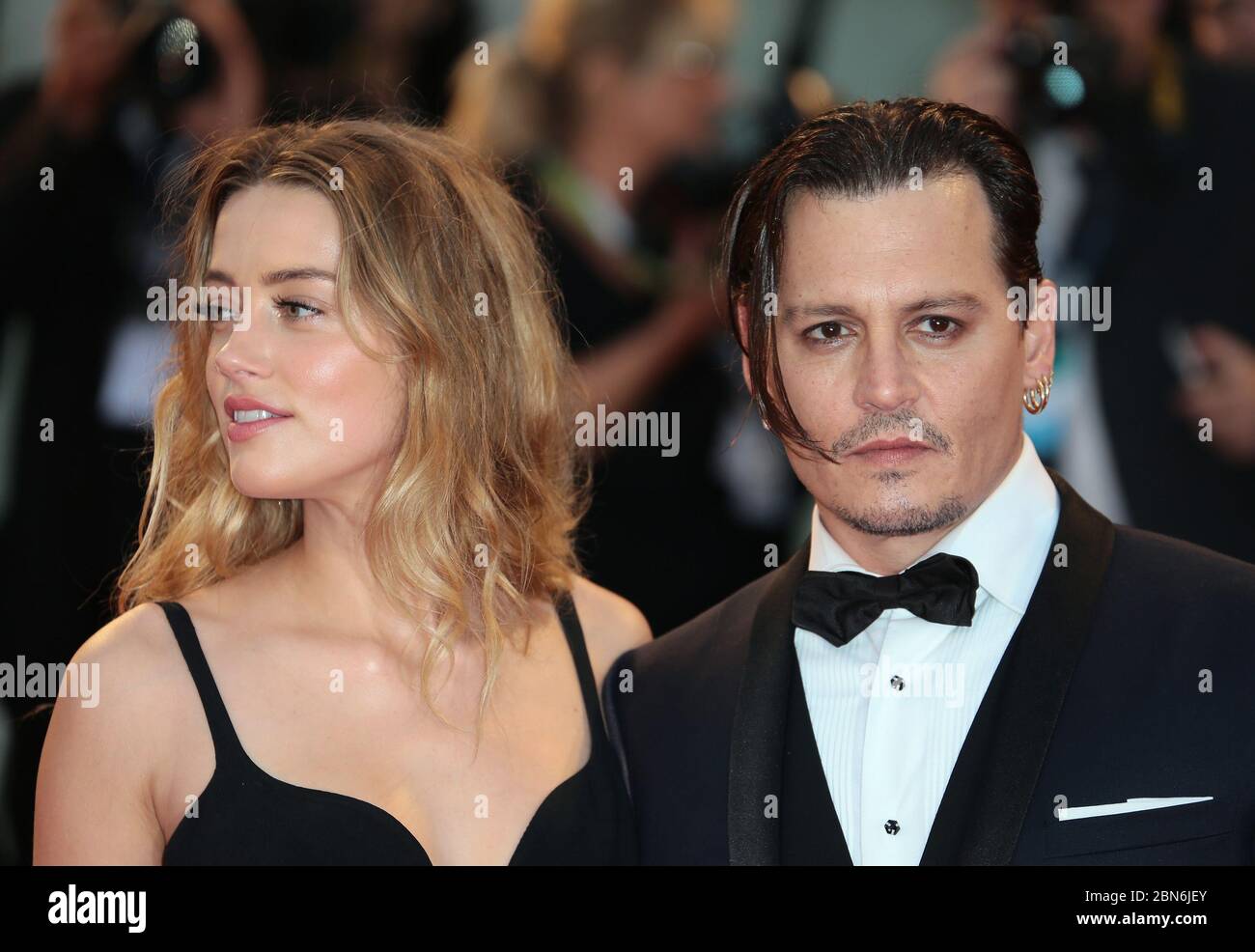 Johnny Depp and Amber Heard attends the 'Black Mass' red carpet during ...