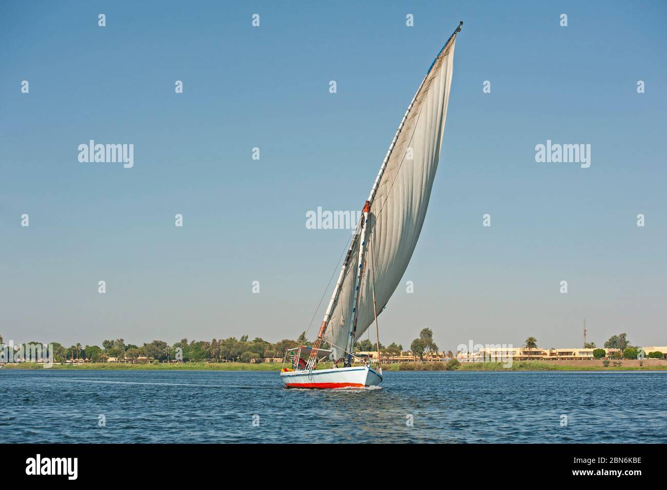 Traditional Egyptian felluca river boat sailing on the Nile Stock Photo ...