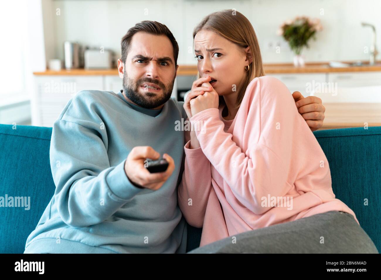Tv scared male couple hi-res stock photography and images - Alamy