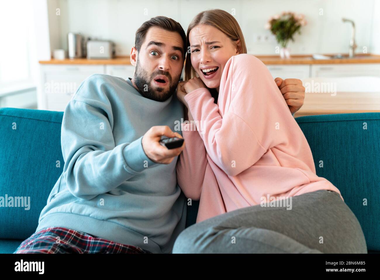 Couple scared hugging hi-res stock photography and images - Alamy