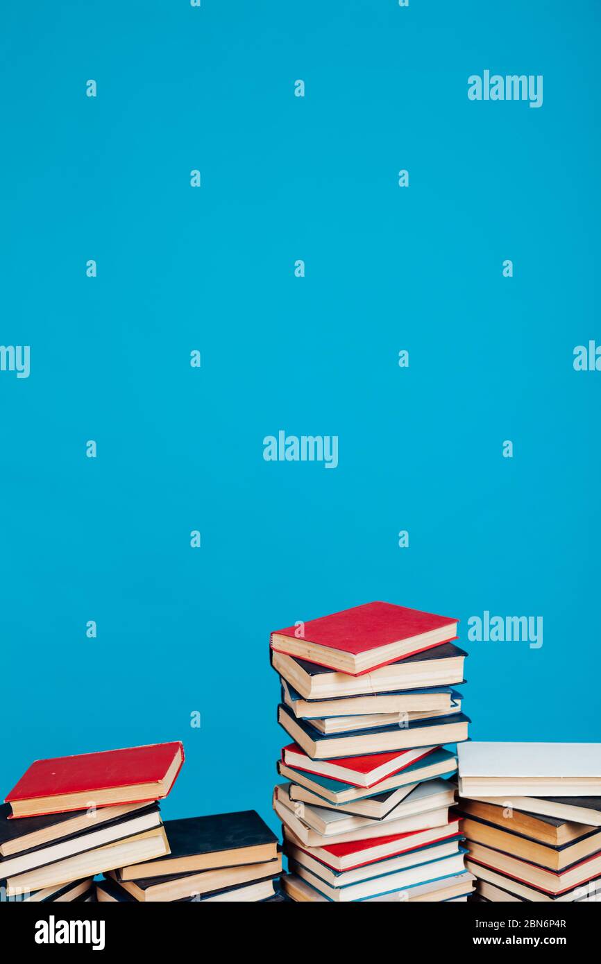 many stacks of educational books to prepare for exams in the university ...