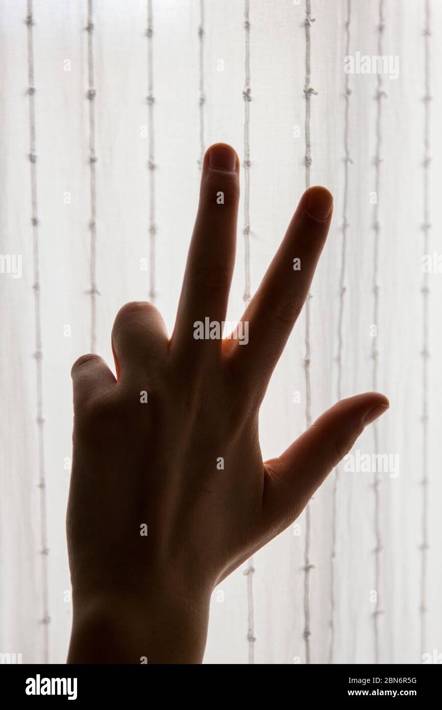 girl hand making directions with fingers Stock Photo - Alamy