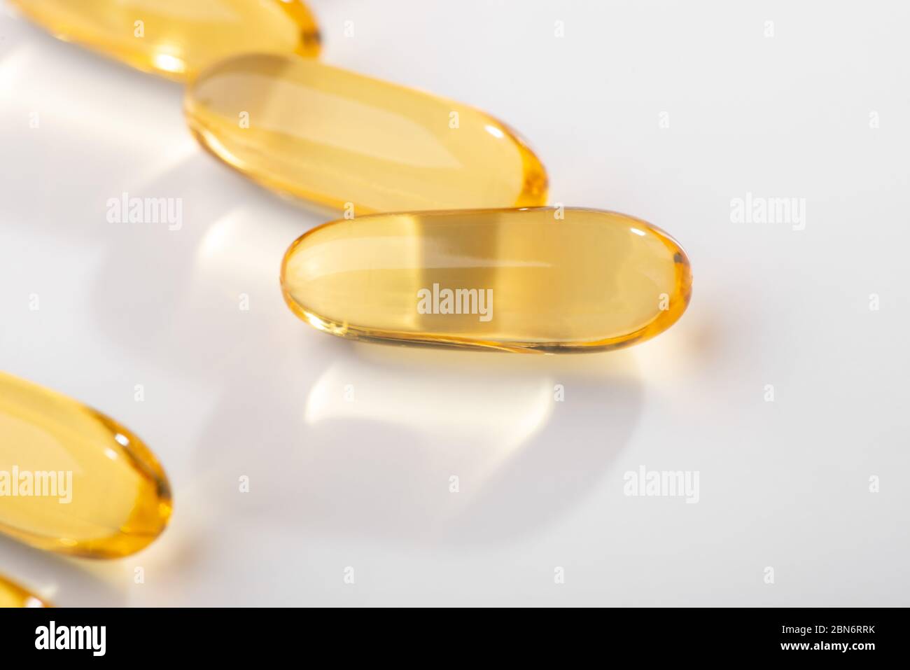 Close-up on Omega-3 fatty acid capsules on white background Stock Photo ...