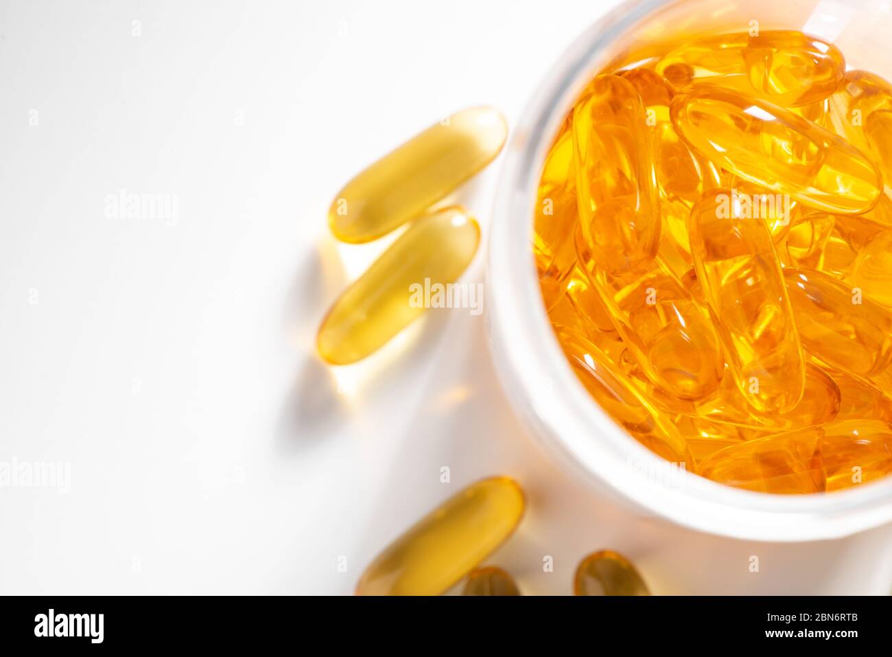 Bottle of Omega-3 capsules on white background Stock Photo - Alamy