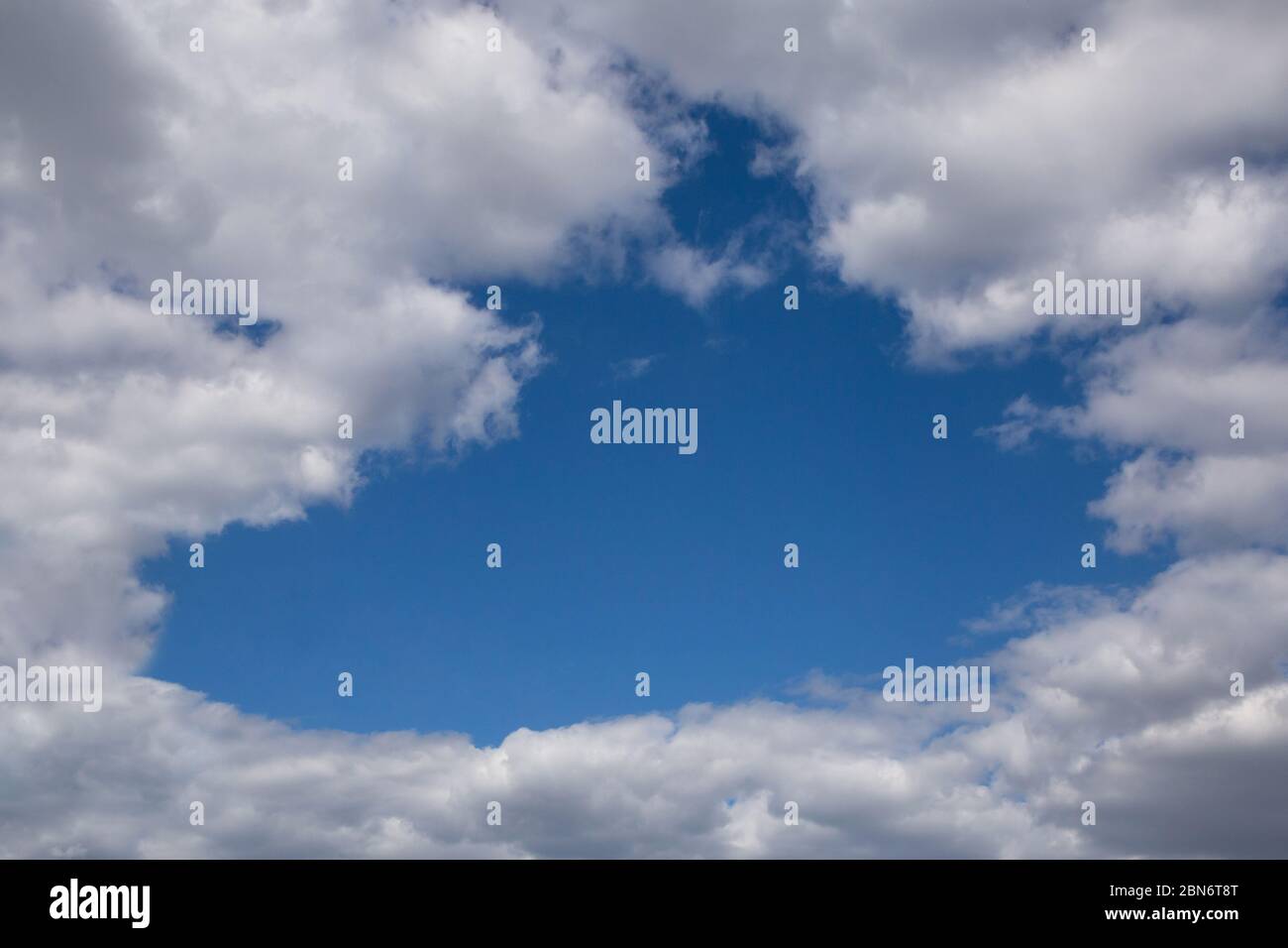 Blue sky with rain clouds hi-res stock photography and images - Alamy