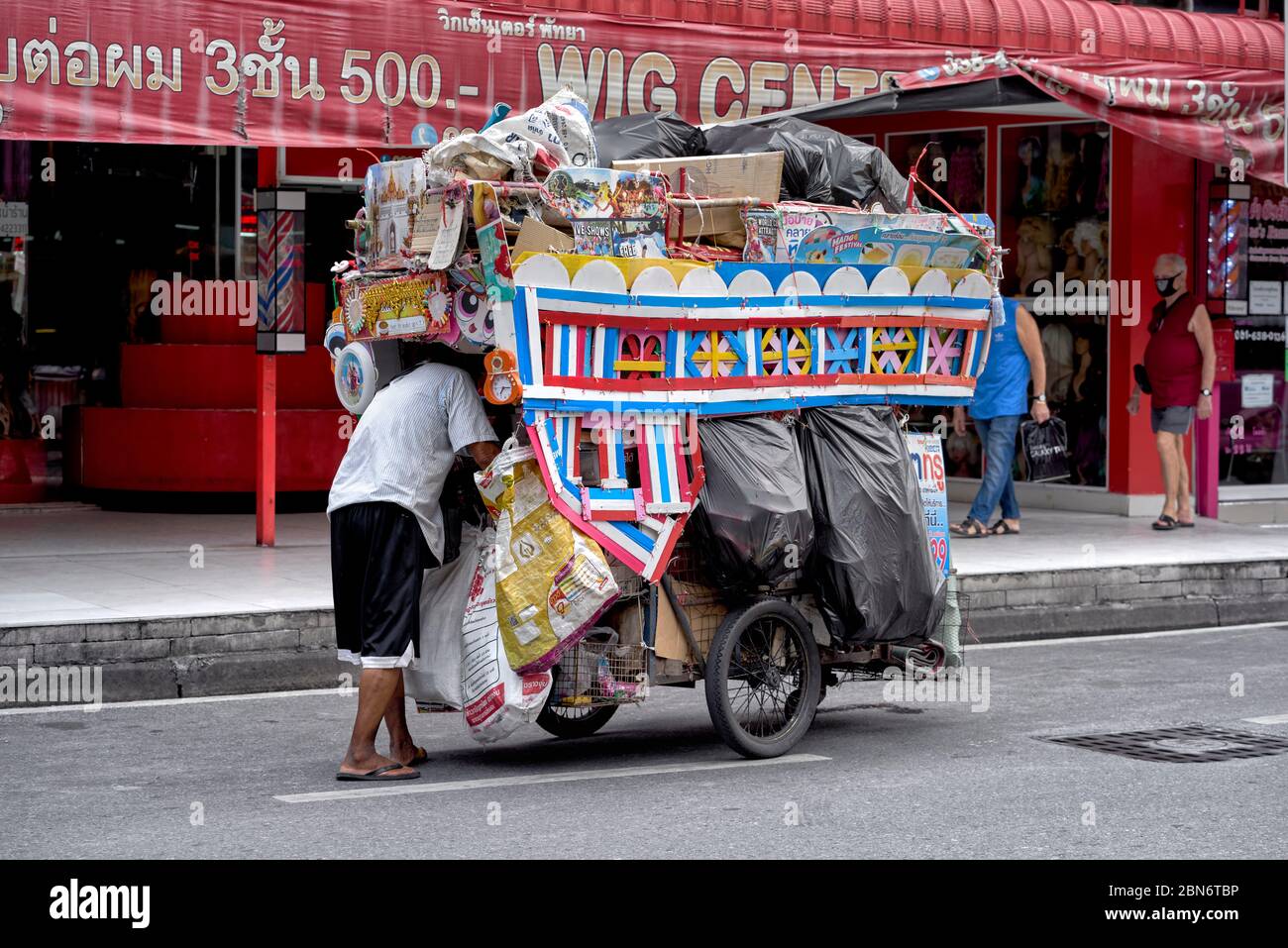 Garbage collector with fully loaded cart. Thailand Southeast Asia Stock ...