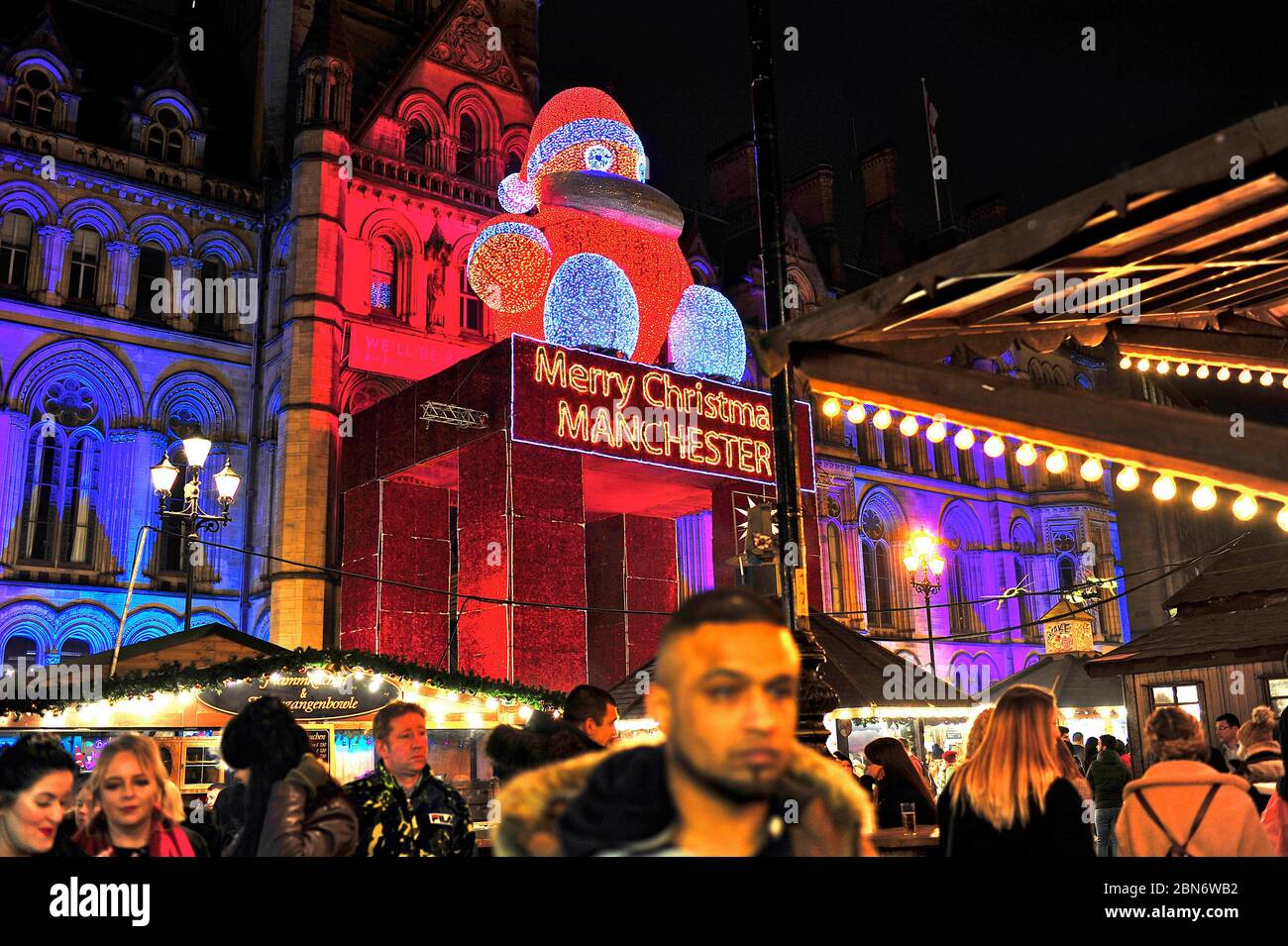 Crowd of visitors at Manchester Christmas market in Albert Square ...