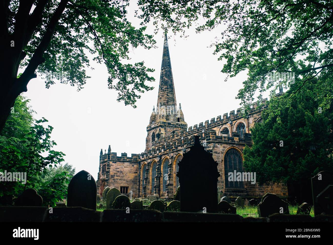 a traditional british english church with a steeple. English wedding ...