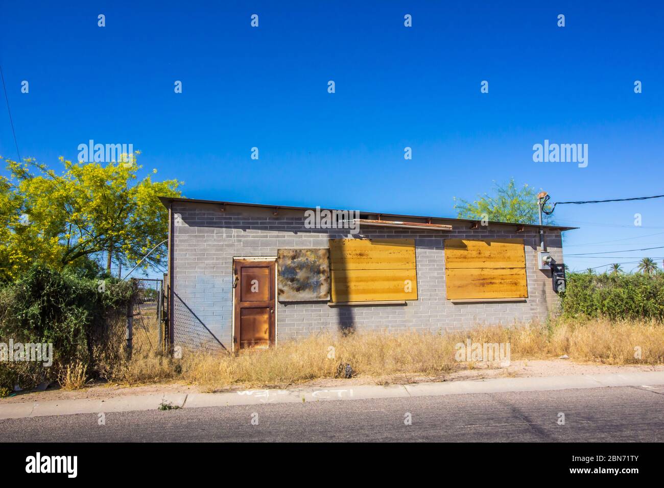 Metal boarded up windows hi-res stock photography and images - Alamy