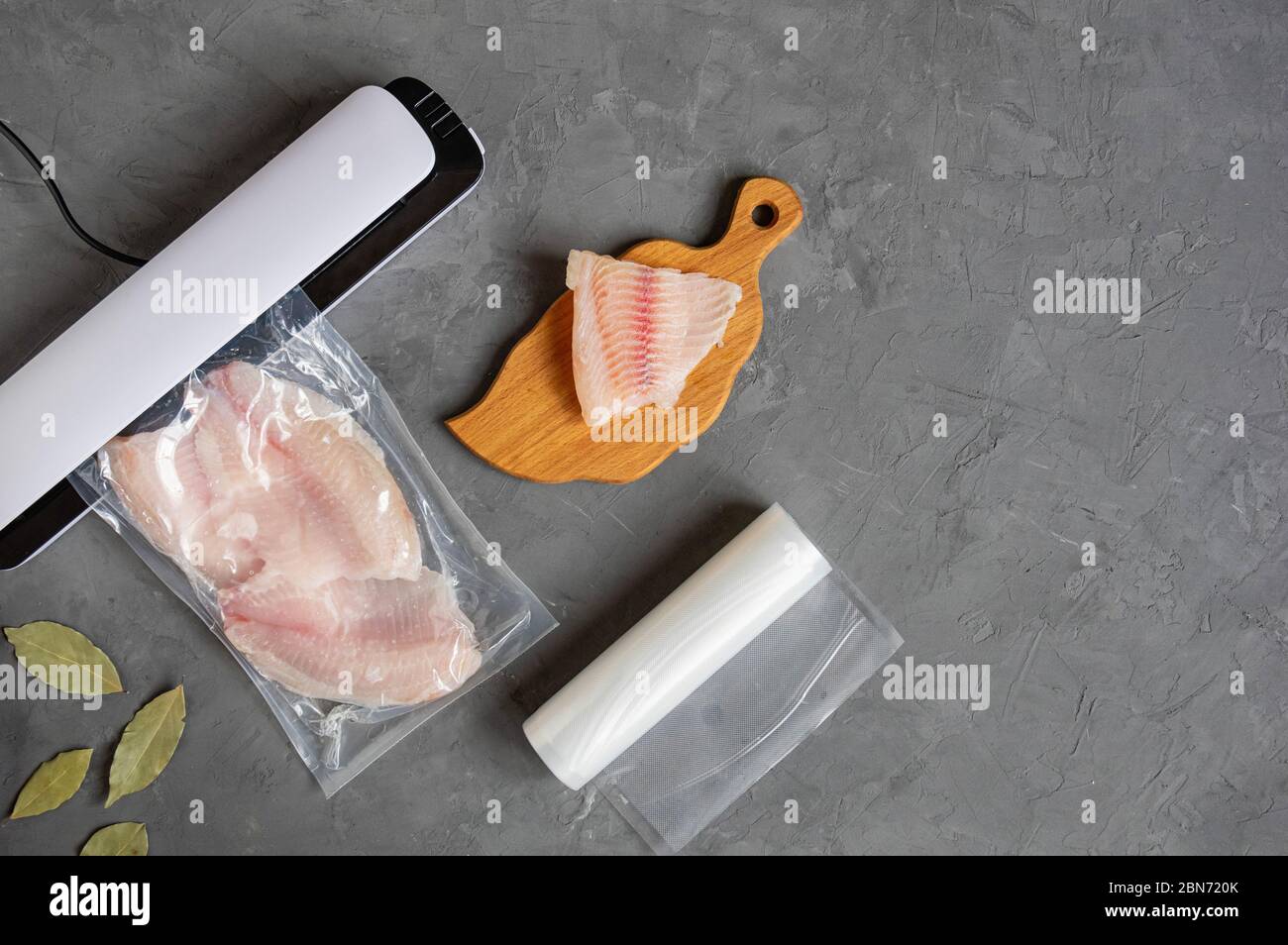 Vacuum packaging of fish. Extending the shelf life of products. Sous ...