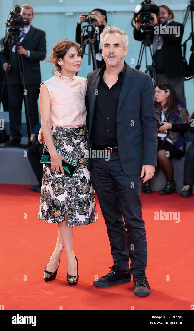 VENICE, ITALY - SEPTEMBER 10: Sheherazade Goldsmith and Alfonso Cuaron ...