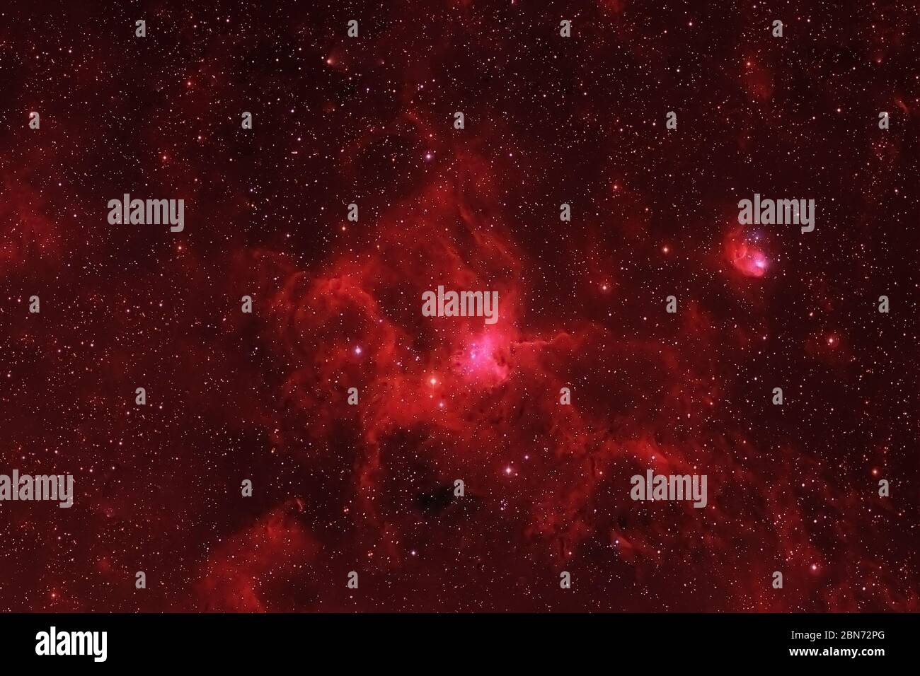 Red galaxy in deep space. Elements of this image were furnished by NASA ...