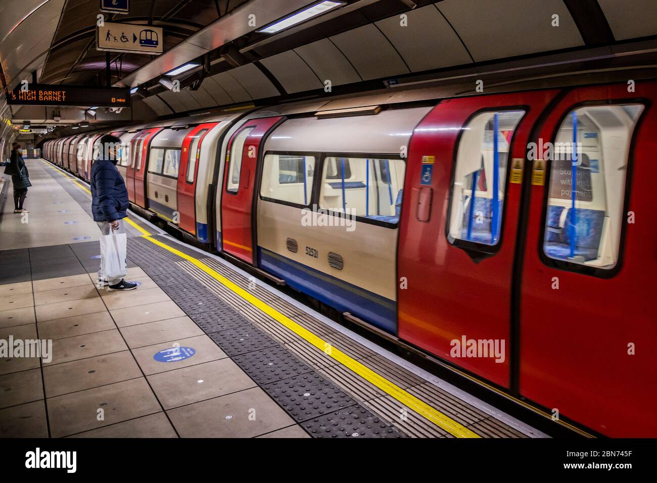Empty tube train woman hi-res stock photography and images - Alamy