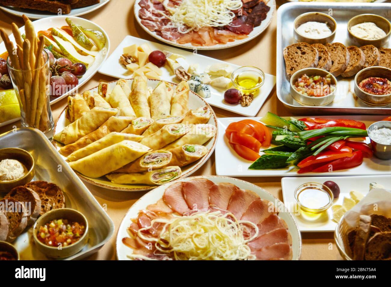 a lot of delicious food on the table, buffet, feast Stock Photo - Alamy