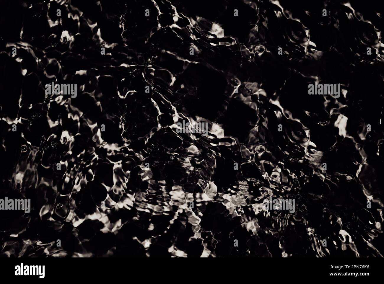 Crude Oil surface texture background Stock Photo - Alamy