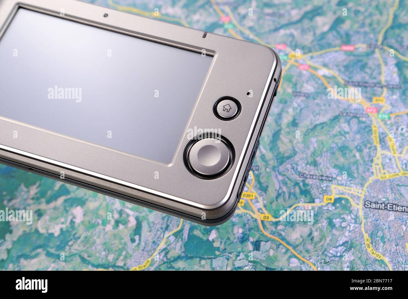GPS navigator on the map Stock Photo - Alamy