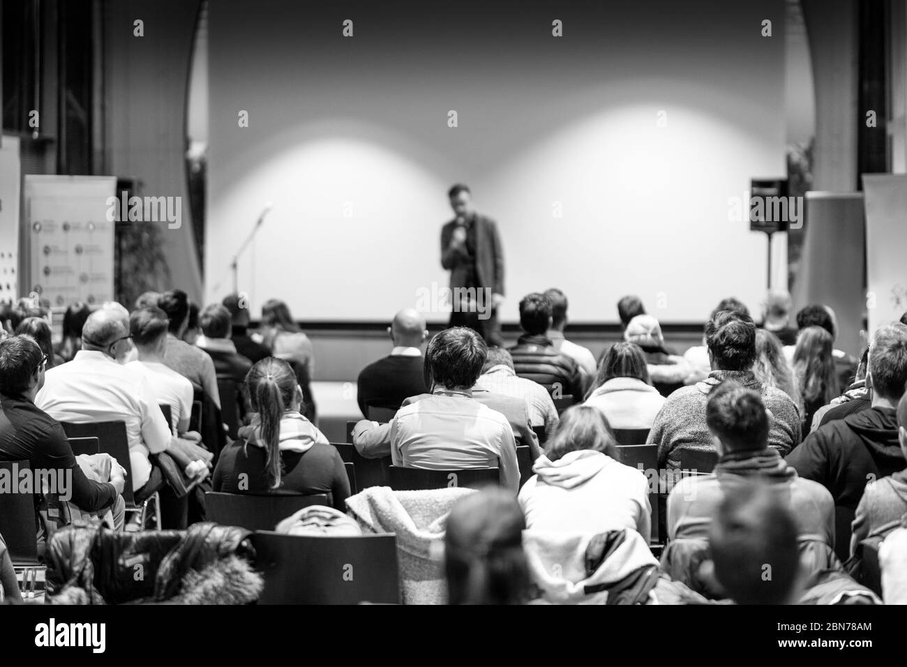 Business speaker giving a talk at business conference event Stock Photo ...