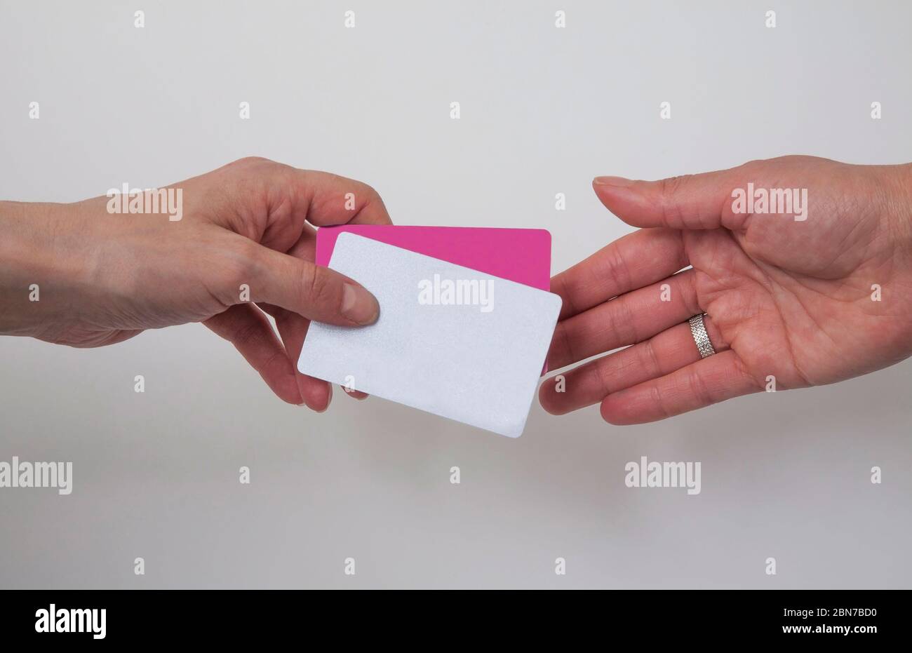 Business people exchanging cards images Stock Photo - Alamy