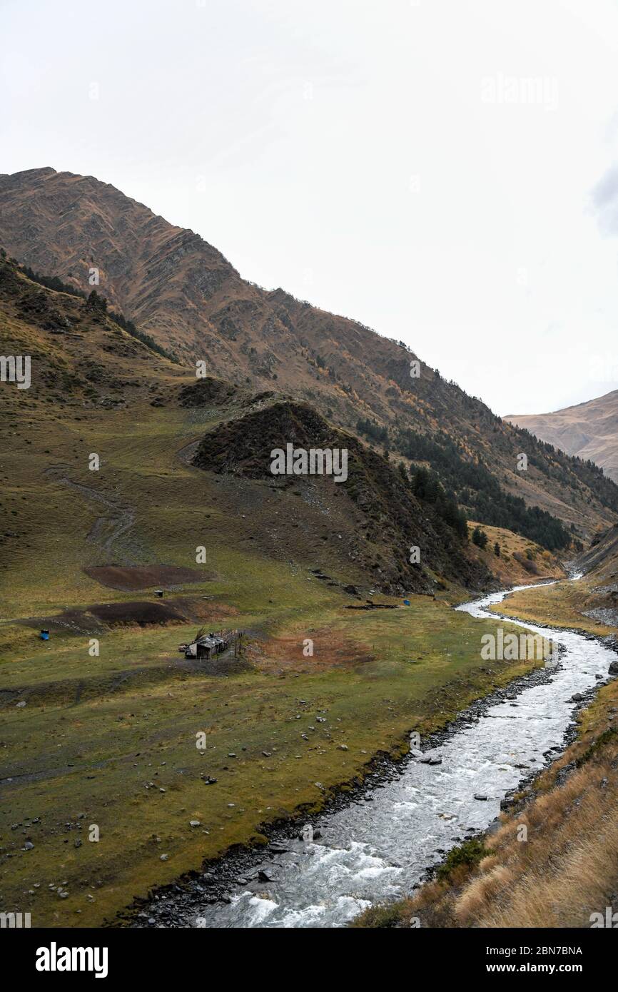 Caucasus, Georgia, Tusheti region, Dartlo. River crossing a mountain ...