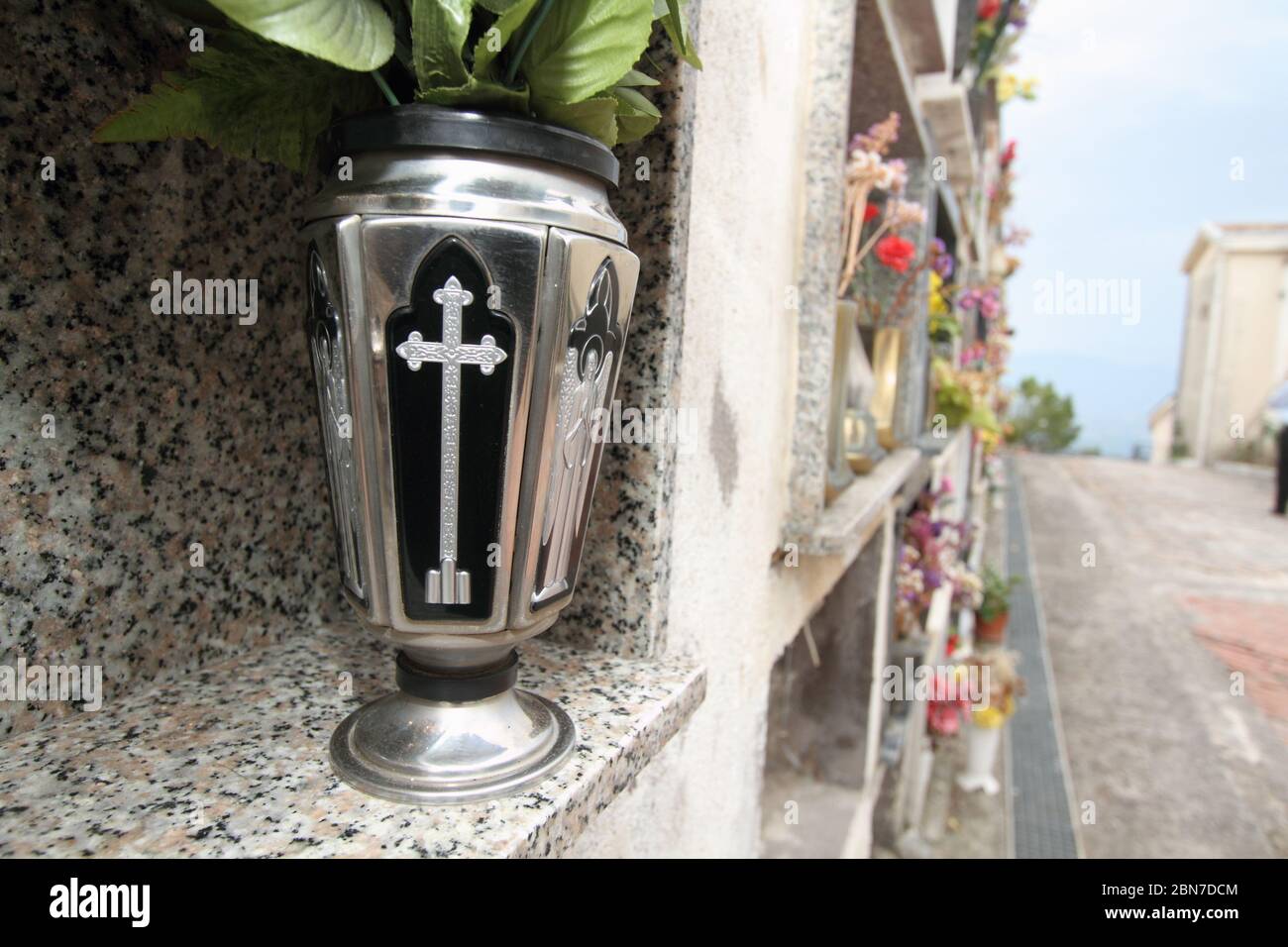 flowers and funeral objects in cemetery Stock Photo - Alamy