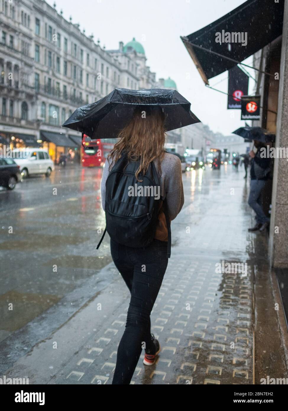 Rain soaked london street hi-res stock photography and images - Alamy