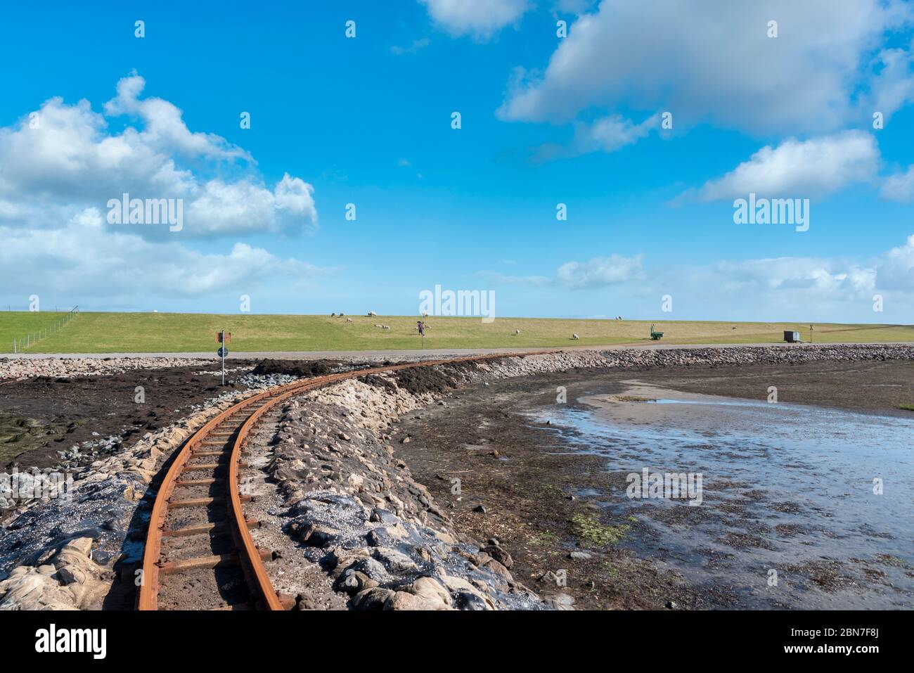 Dike by Luettmoorsiel with rails of the Hallig Railway, also called ...