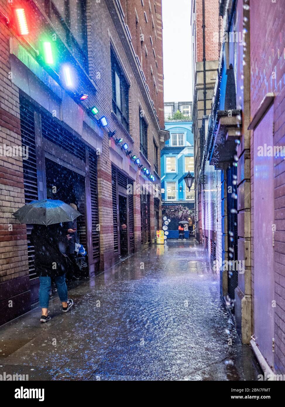 Rain soaked london street hi-res stock photography and images - Alamy