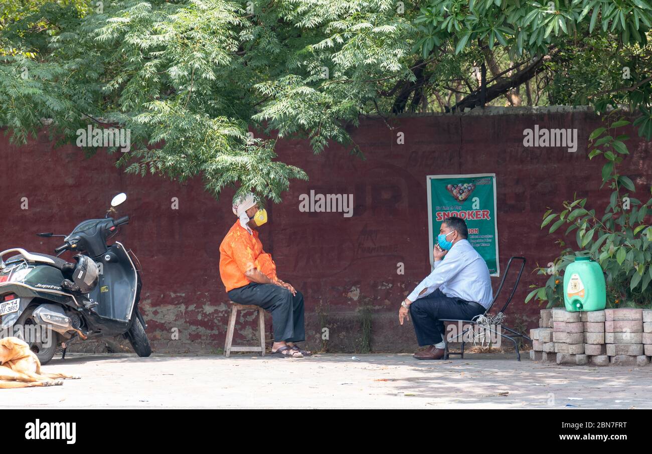 Social Distancing, People talking each other with maintaining distance ...