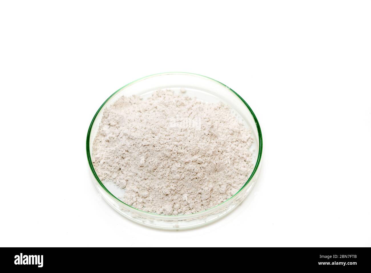 Powder of Gypsum in petri dish on white background Stock Photo - Alamy