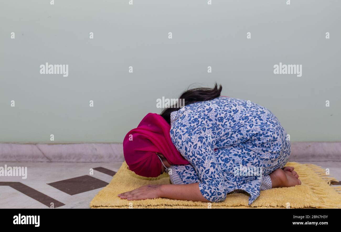 Muslim woman making traditional prayer hi-res stock photography and ...