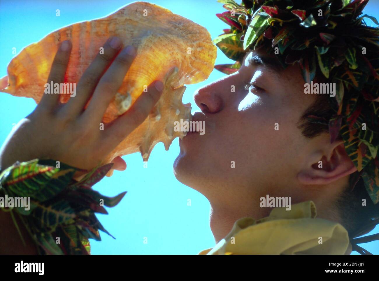 Man blowing into horn hi-res stock photography and images - Alamy