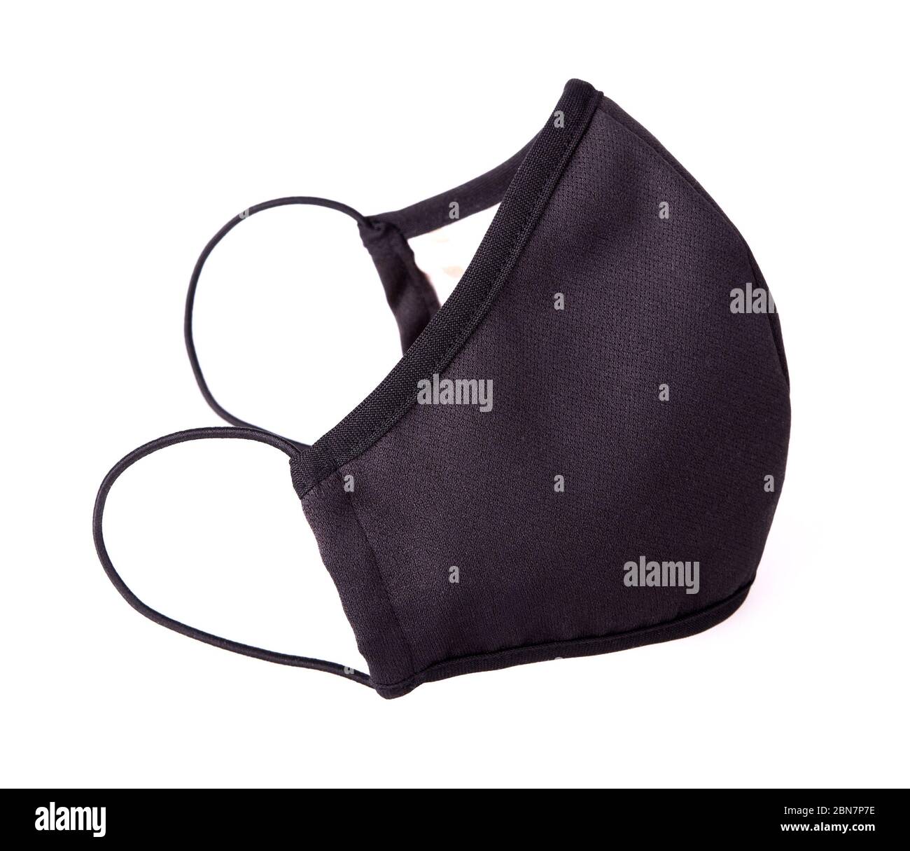 Black fabric facial mask for health protection isolated on white ...