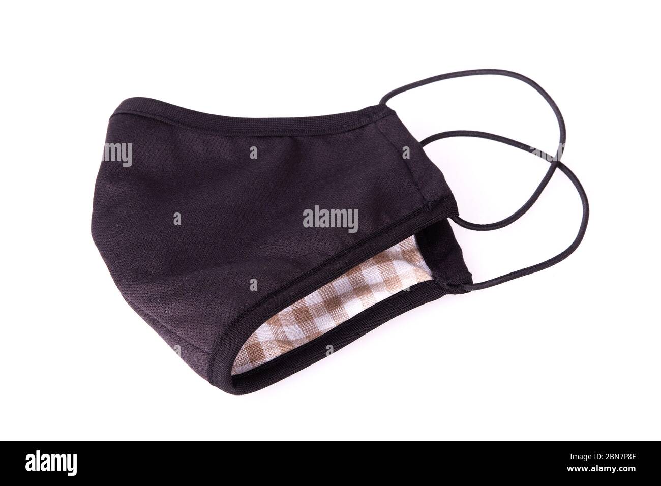 Black fabric facial mask for health protection isolated on white ...