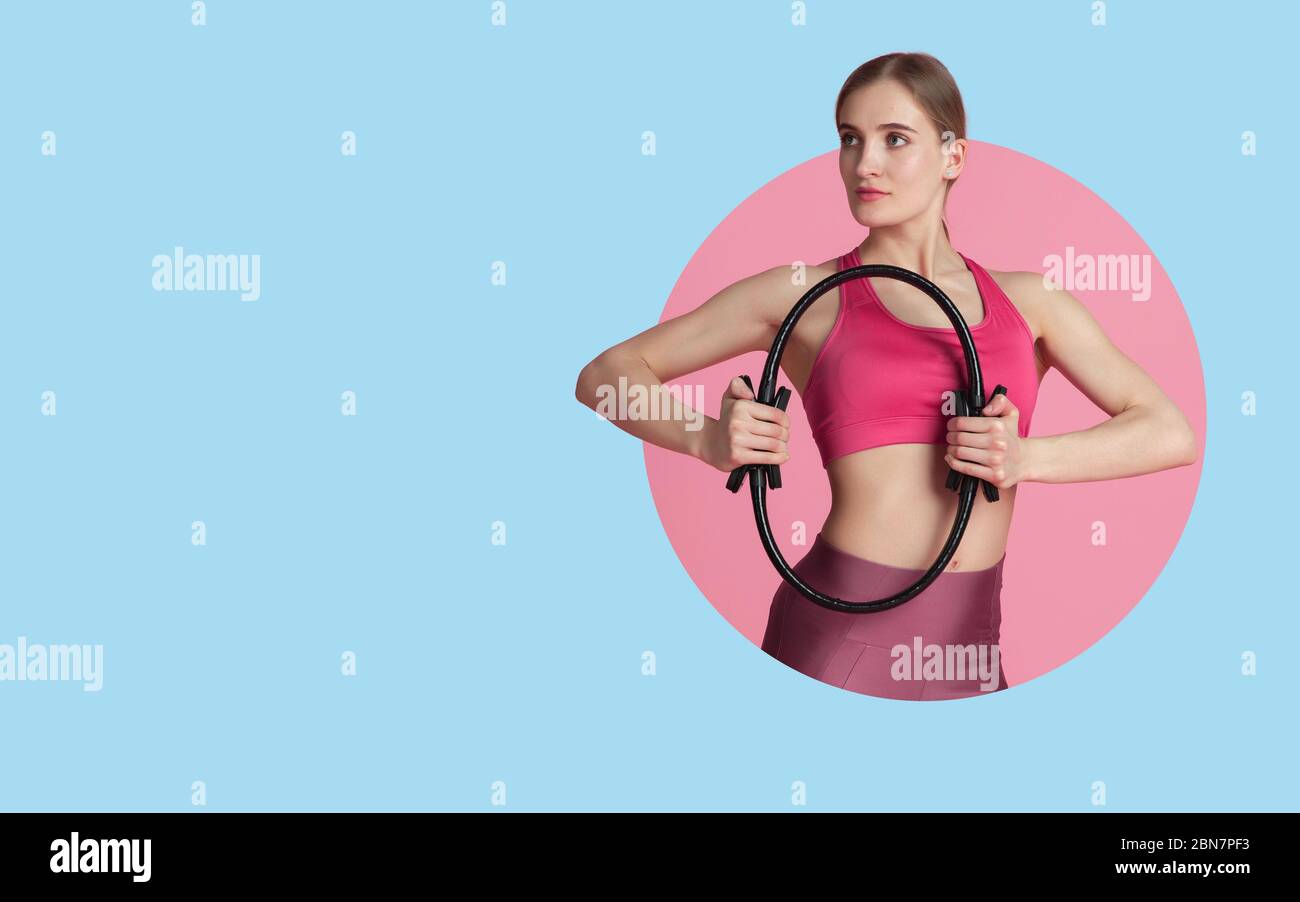 Portrait of young woman on bright bicolor background with geometric ...