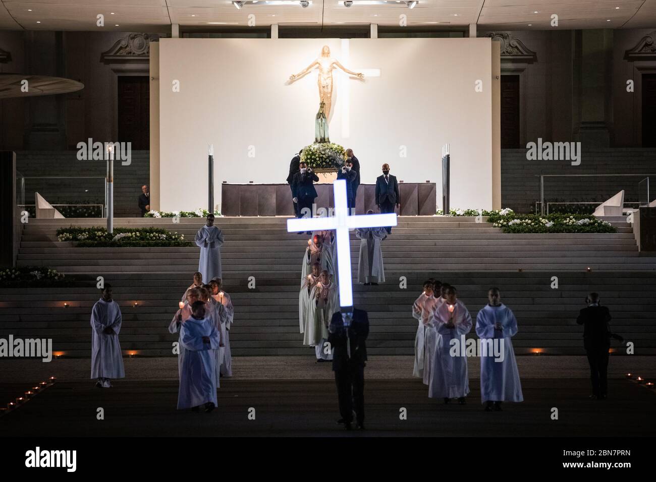 Christians carry an image of Our Lady of Fatima to the altar during the ...