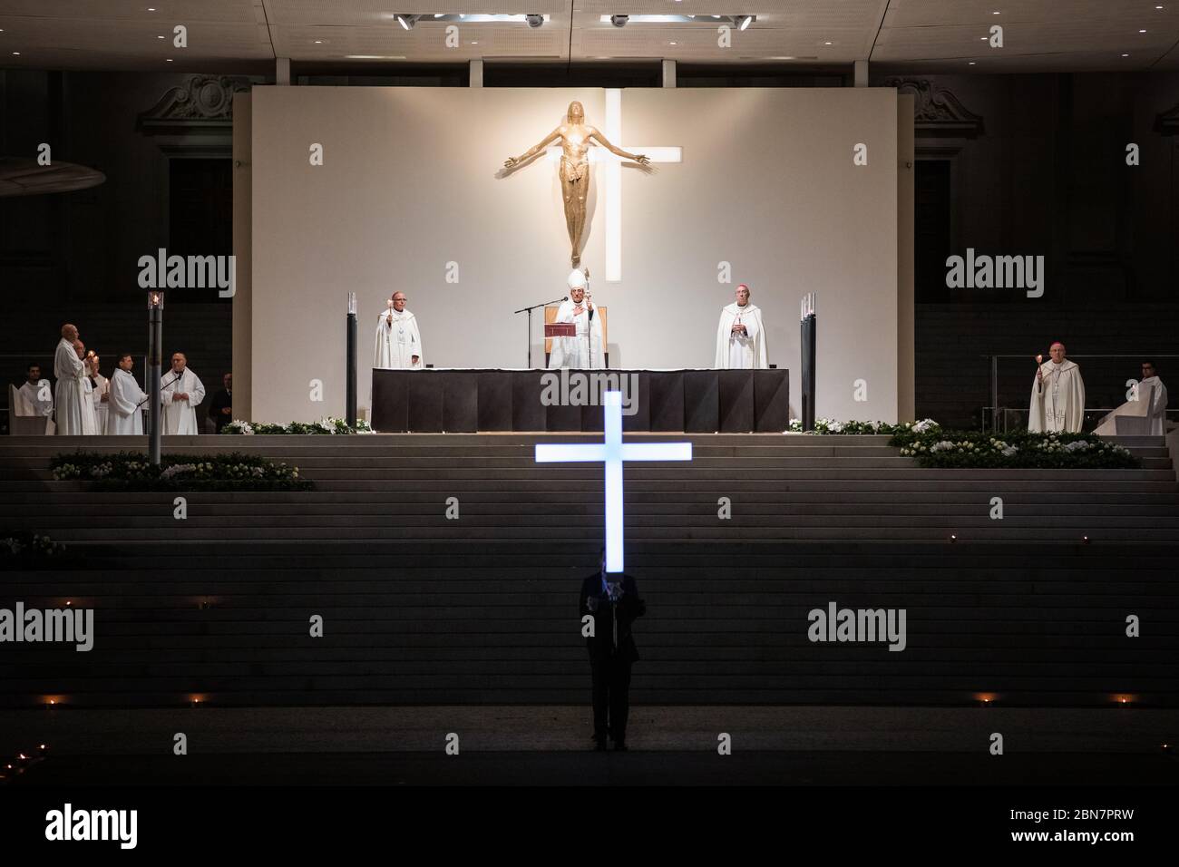 Fatima, Portugal. 12th May, 2020. A christian carries a cross during ...