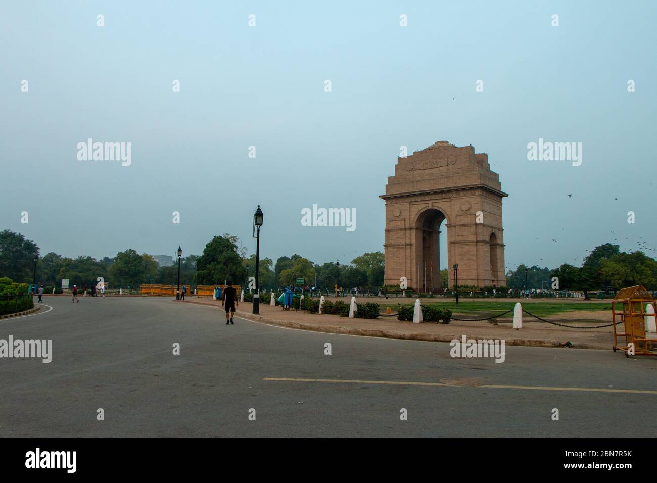 Wide shot of National War Memorial - India Gate in New Delhi. Birds ...