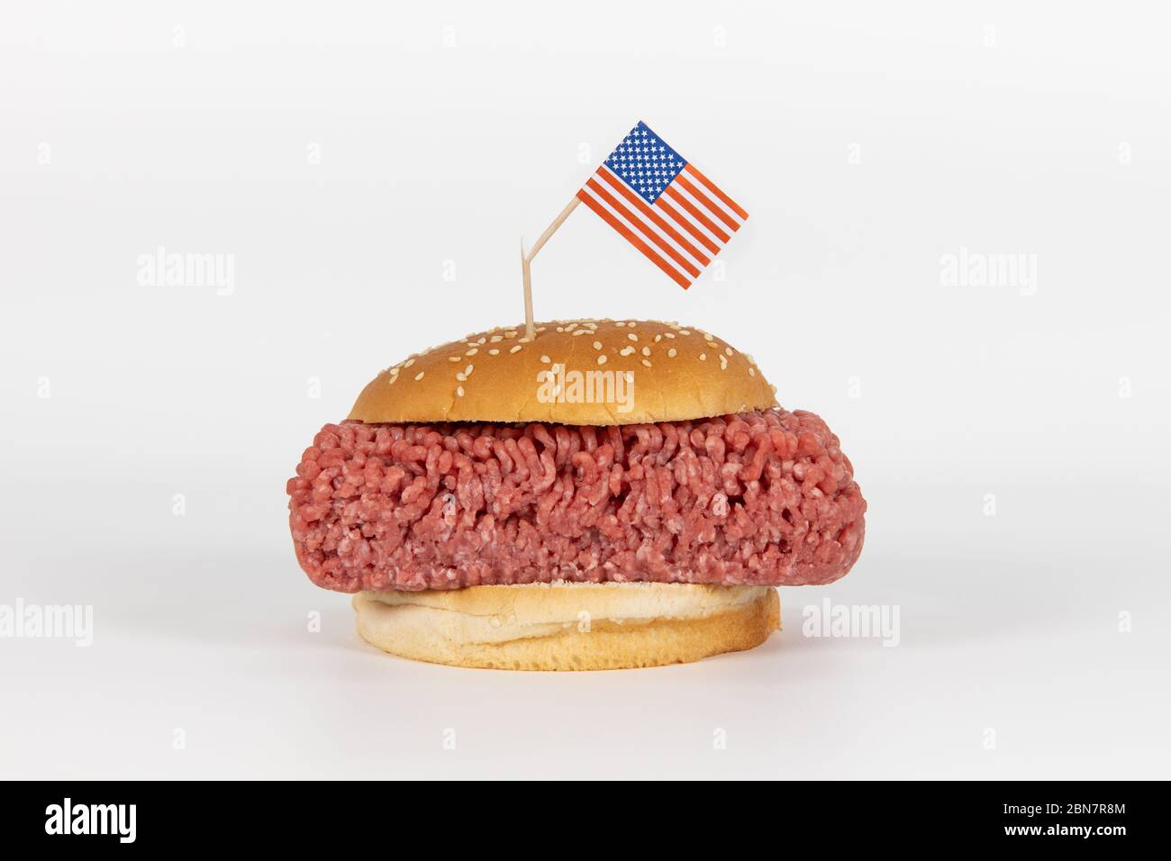 Hamburger with fresh raw minced meat and broken usa flag Stock Photo ...