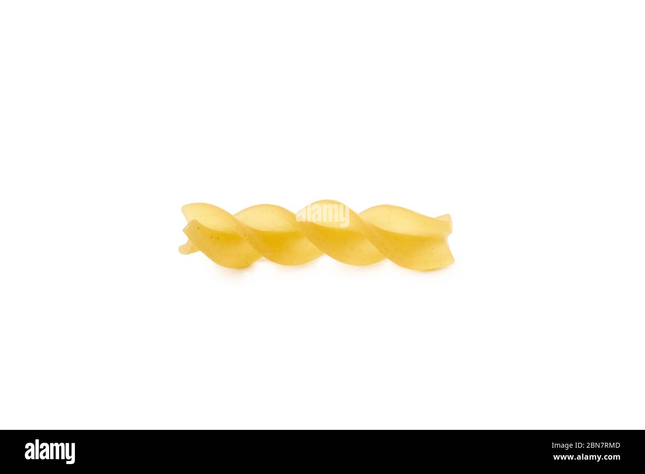 Italian raw dry pasta fusilli isolated on white background Stock Photo ...