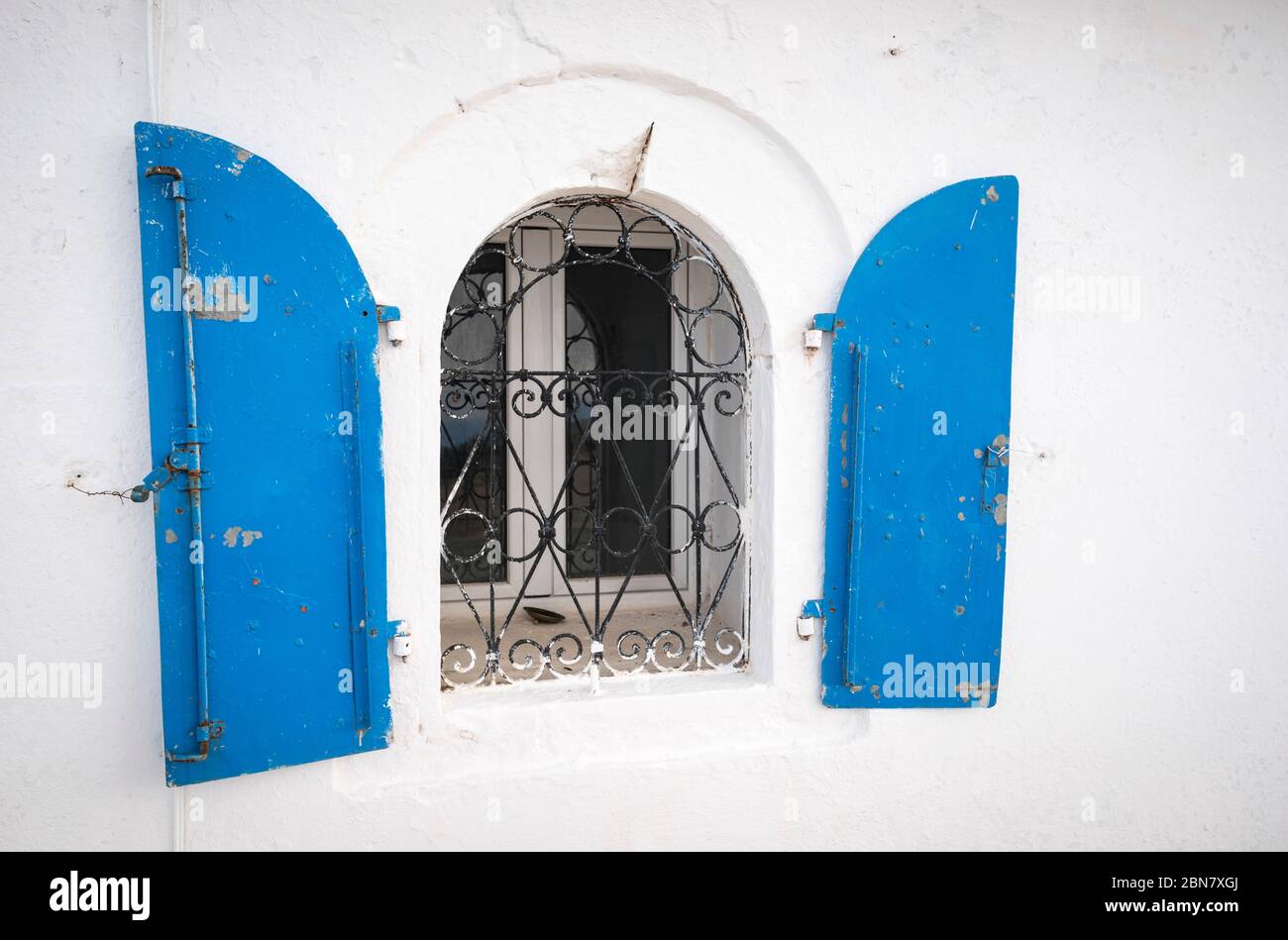 a window of the Prophet Elias Holy Temple, an orthodox church is ...