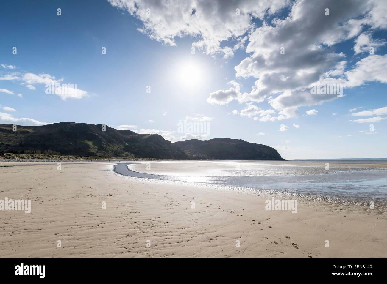 Conwy Morfa beach on the North Wales coast looking towards Penmaen bach ...