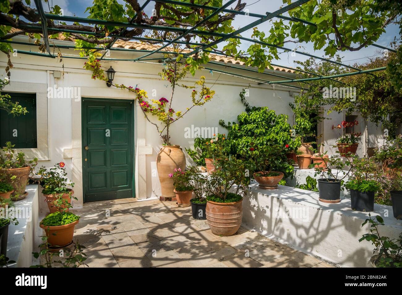 Beautiful garden terrace outside a house in Corfu, Greece Stock Photo ...