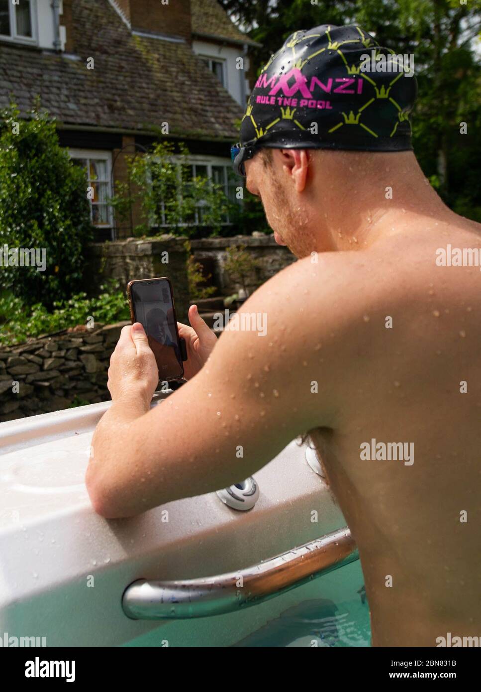 British swimmer Luke Greenbank trains at pool in Ed Baxter's home in ...